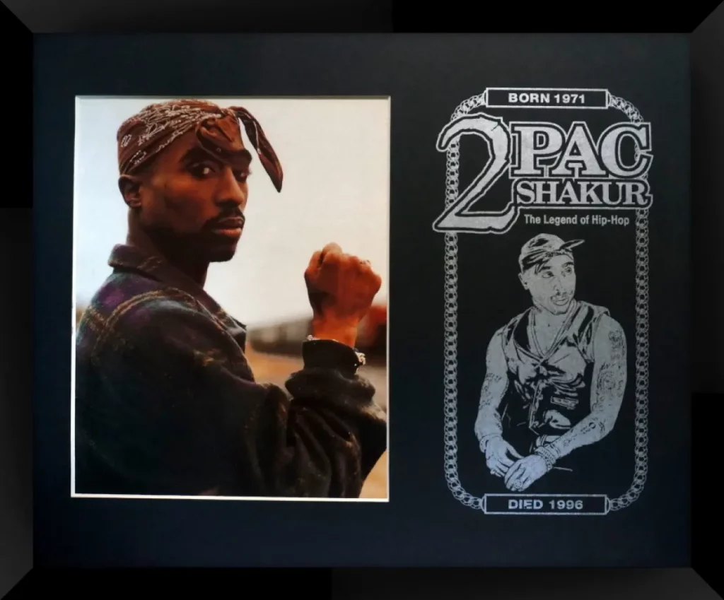 Tupac Shakur Fist Photo With A Screen Printed Mat And Black Frame